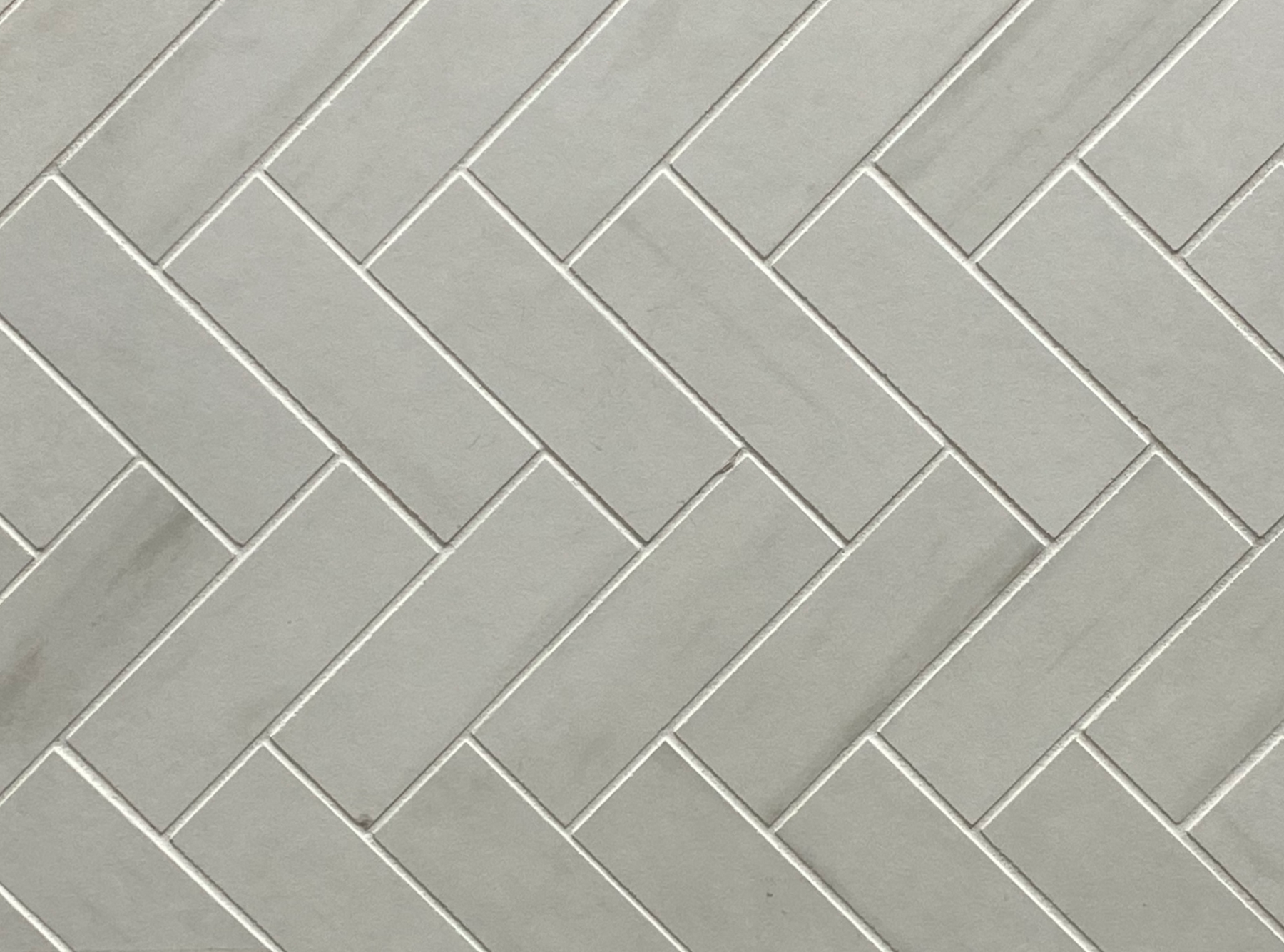 Epic Herringbone Dolomite | Tile Market of Delaware